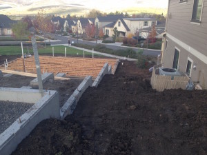 Large stepped house pad, utilities, backfilling in Ashland - Daily ...