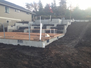 Large stepped house pad, utilities, backfilling in Ashland - Daily ...